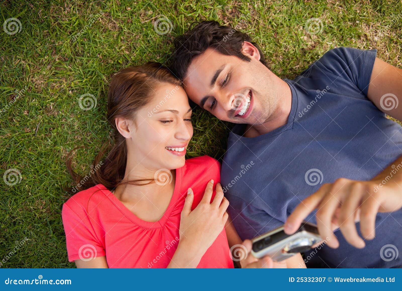 Two Smiling Friends Looking at Photos on a Camera Stock Image - Image ...
