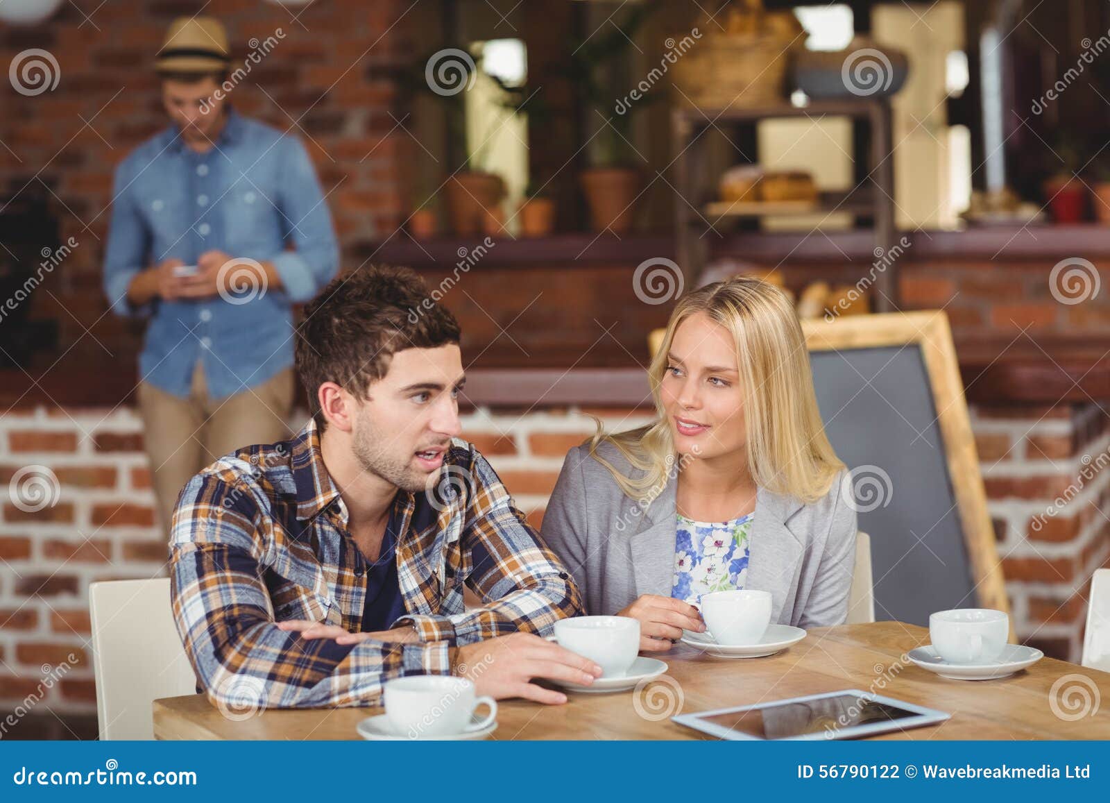 Two Smiling Friends Talking and Drinking Coffee Stock Photo - Image of ...
