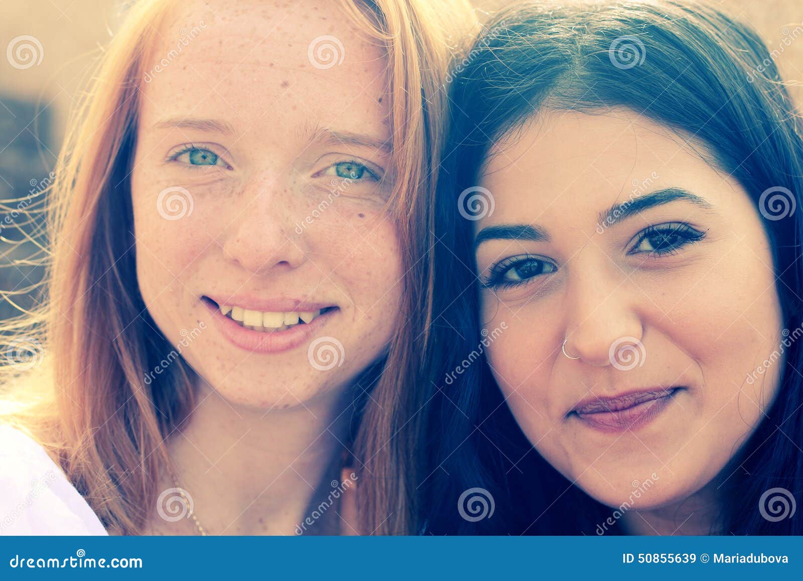 Two smiling girlfriends stock image. Image of modern - 50855639