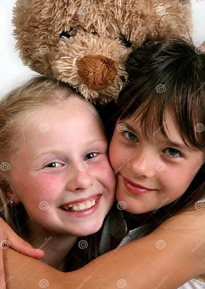 Two smiling girls stock image. Image of brunette, people - 3568169