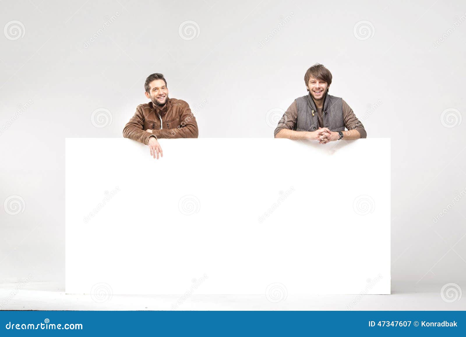 Two Smiling Guys with Huge Banner Stock Image - Image of placard ...