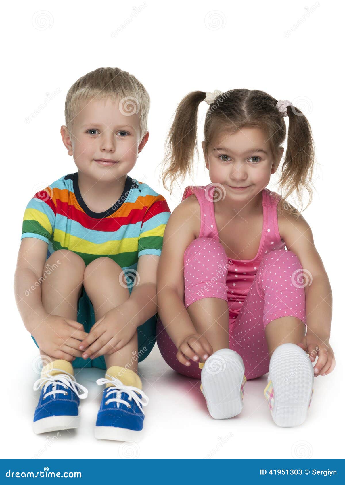 Two smiling kids stock image. Image of isolated, girl - 41951303