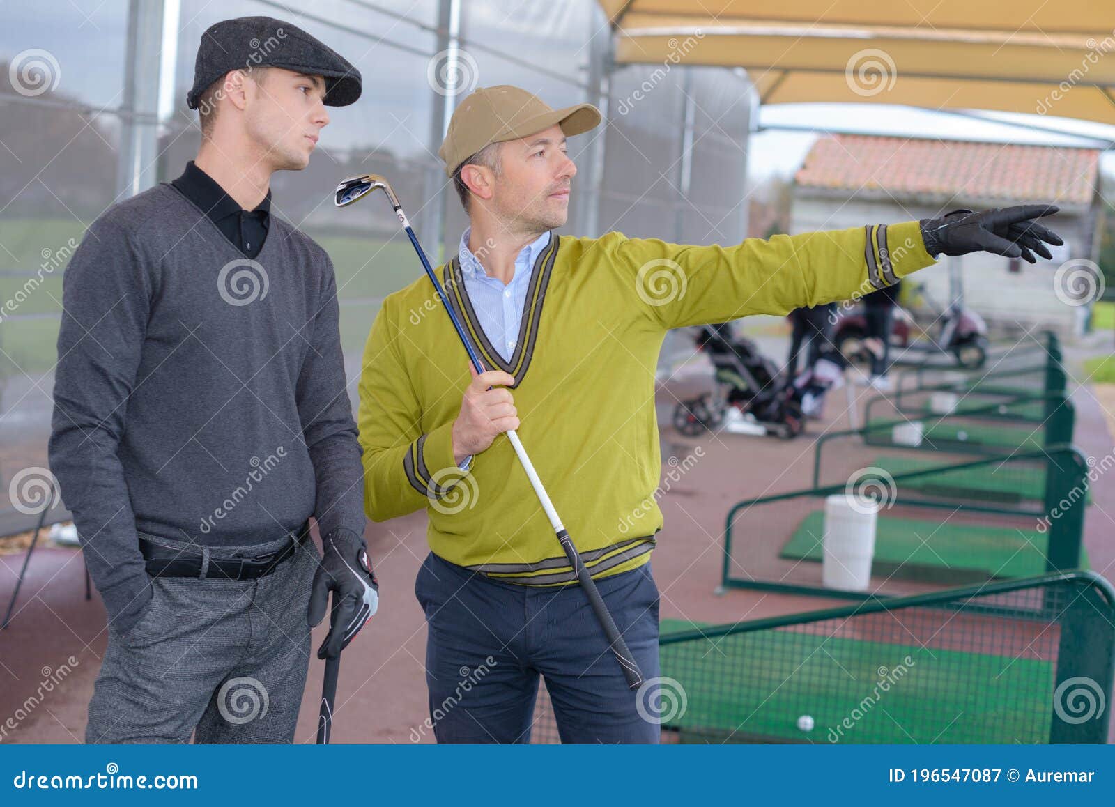 Two Smiling Men Golfers Talking on Golf Course Stock Image - Image of ...