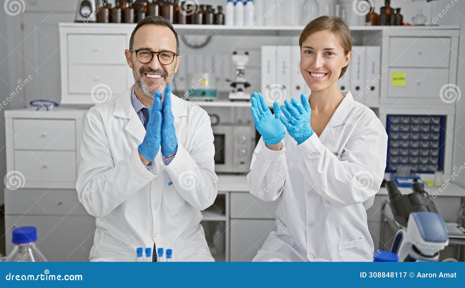 Two Smiling Scientists Clapping Hands in Applause, Celebrating Major ...