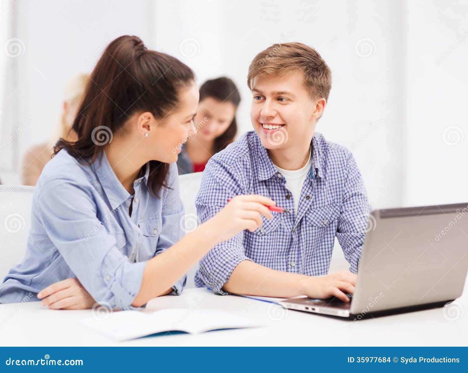 Two Smiling Students with Laptop Computer Stock Photo - Image of ...