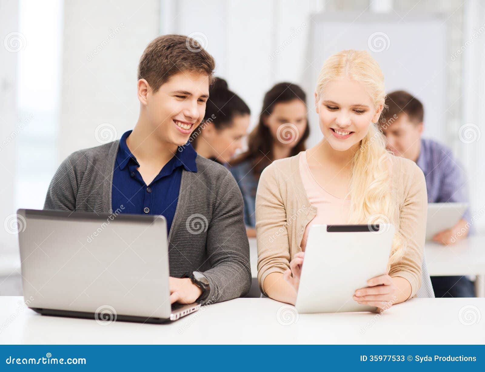 Two Smiling Students with Laptop and Tablet Pc Stock Image - Image of ...