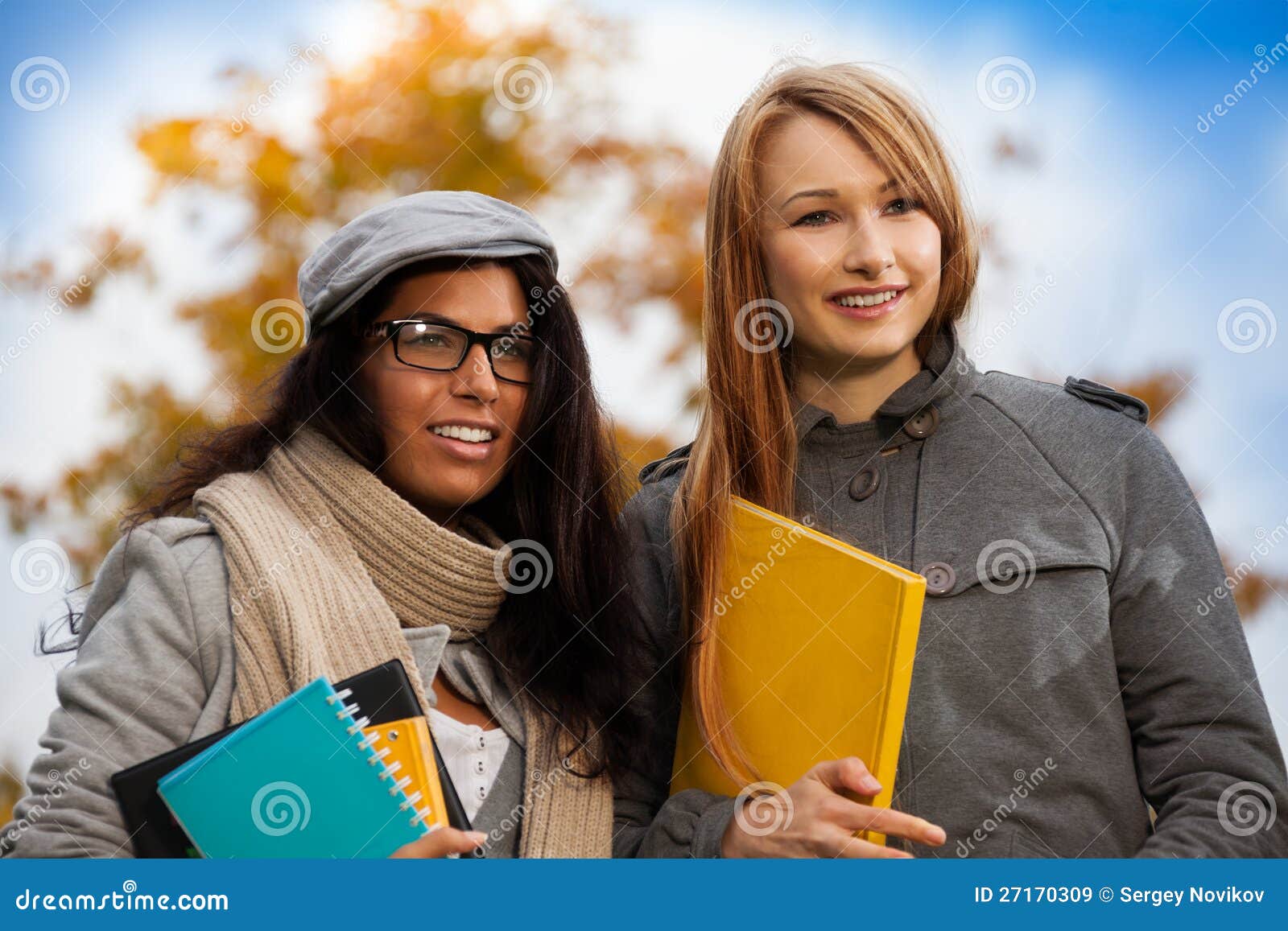 Two Smiling Students in Park Stock Image - Image of portrait ...