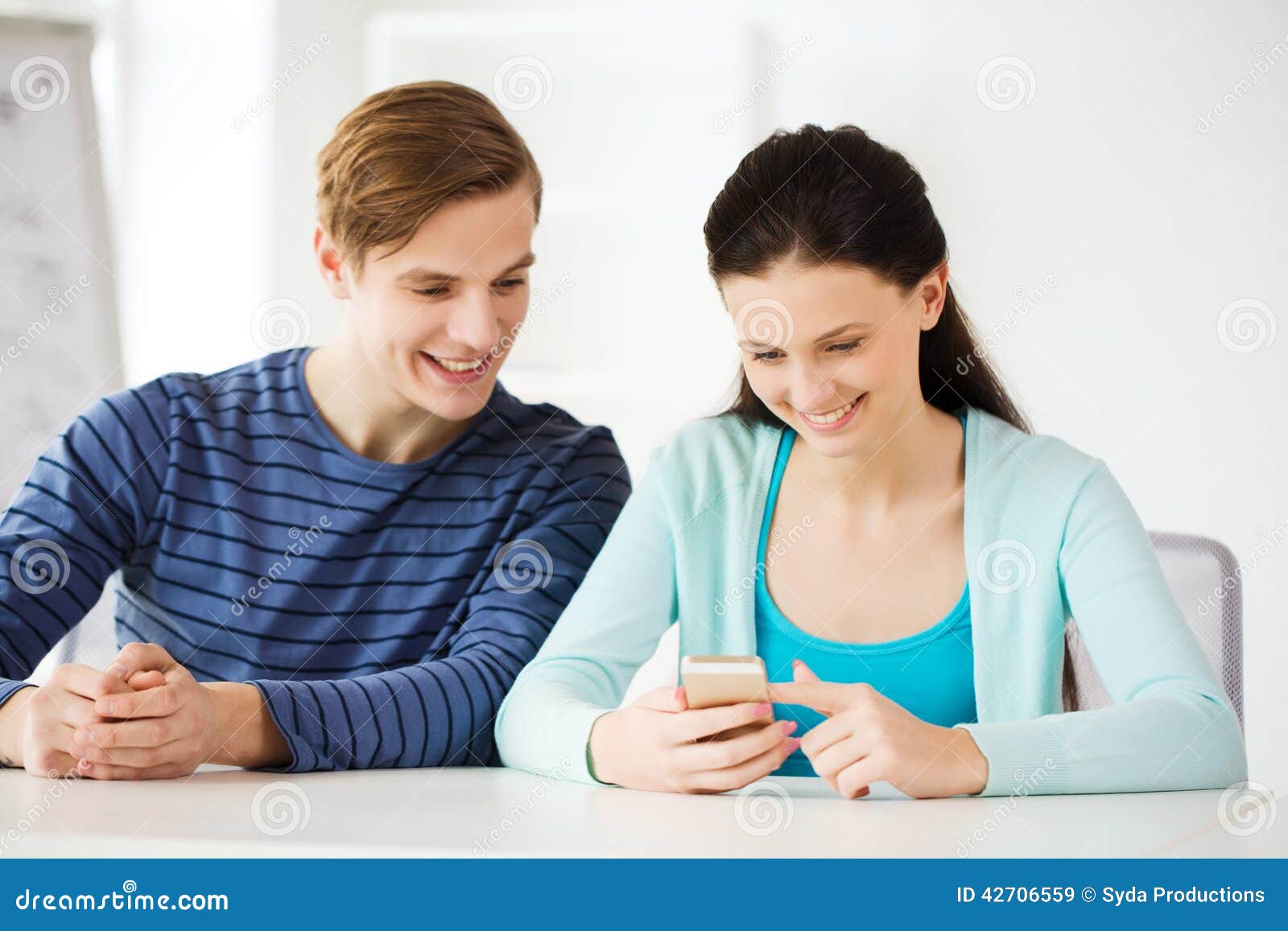 Two Smiling Students with Smartphone at School Stock Image - Image of ...