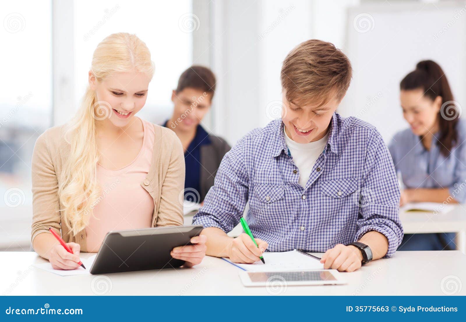 Two Smiling Students with Tablet Pc and Notebooks Stock Image - Image ...