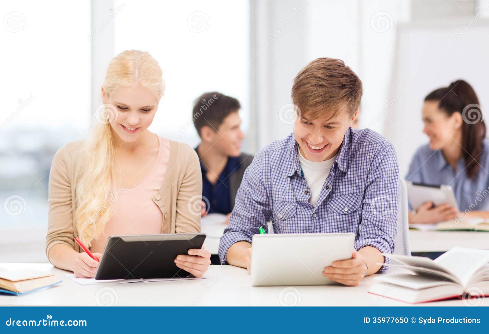 Two Smiling Students with Tablet Pc at School Stock Photo - Image of ...
