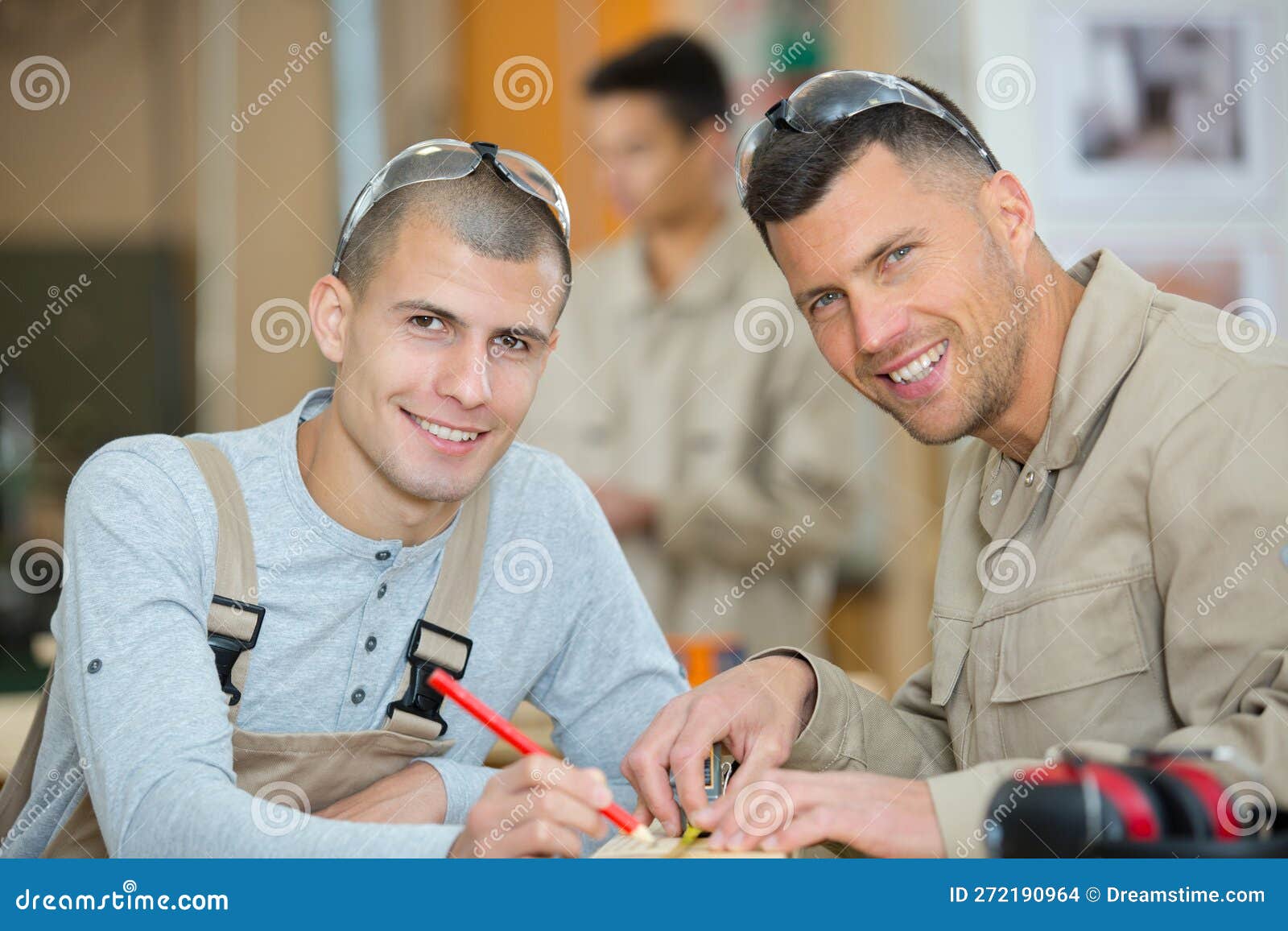 Two Smiling Technicians in Workshop Stock Photo - Image of technology ...