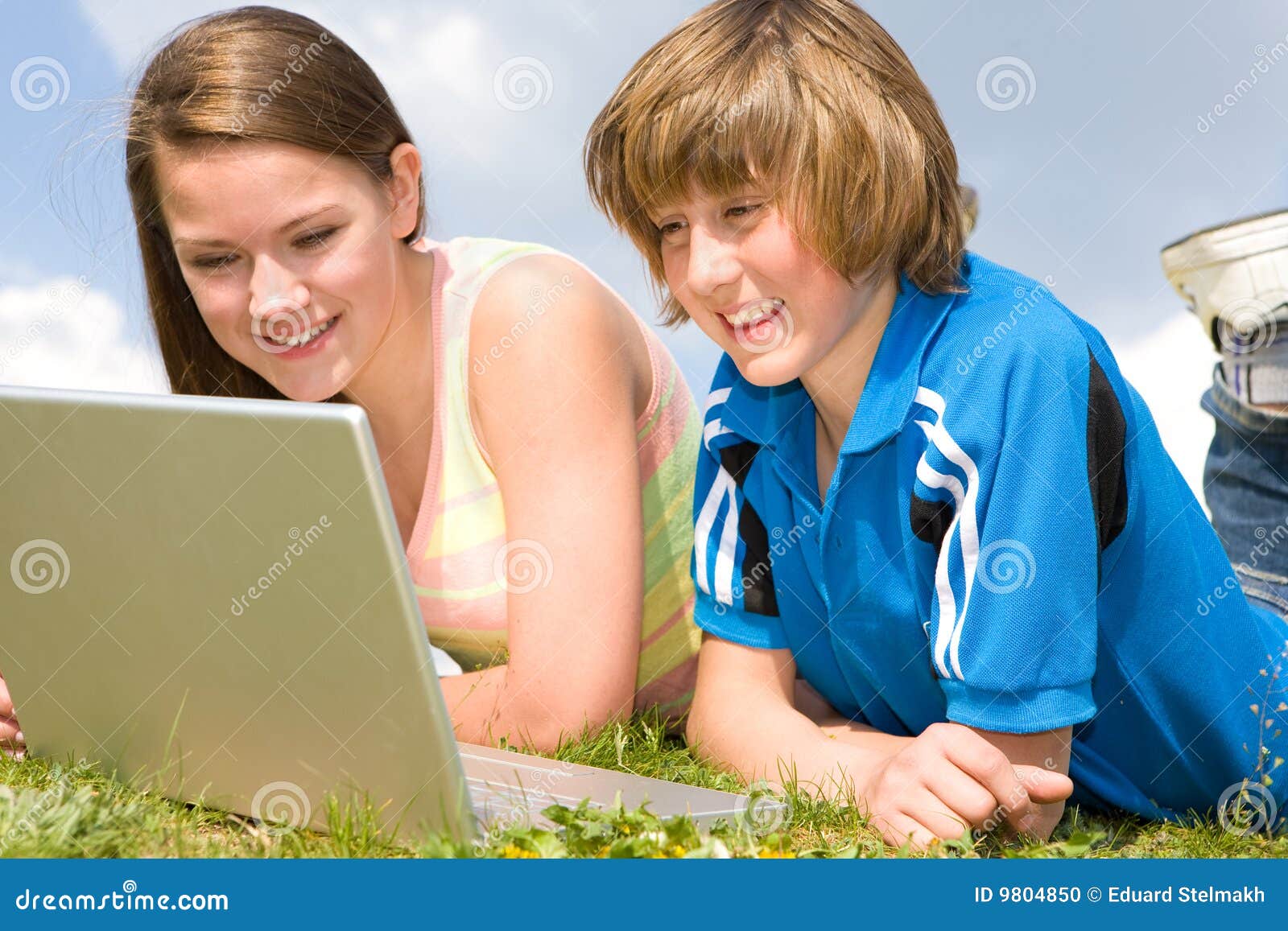 Two Smiling Teenagers with Laptop Stock Photo - Image of cute ...