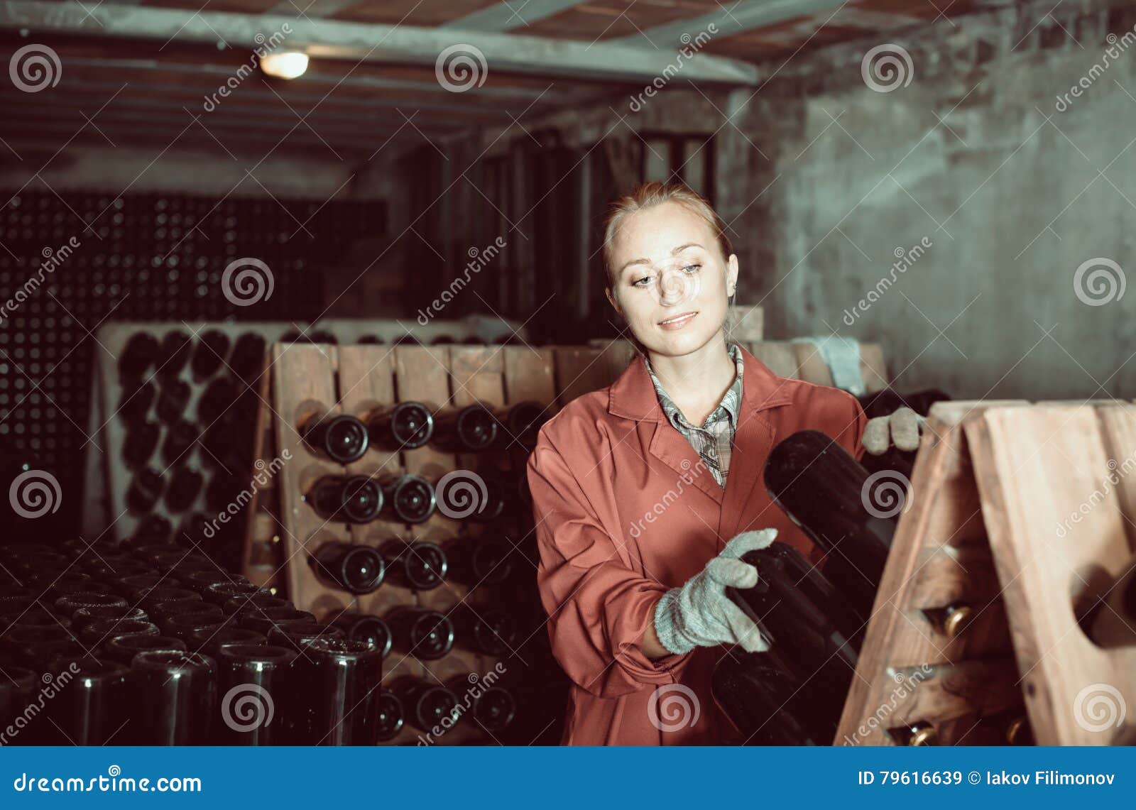 Two Smiling Winery Employees in Aging Section in Cellar Stock Image ...
