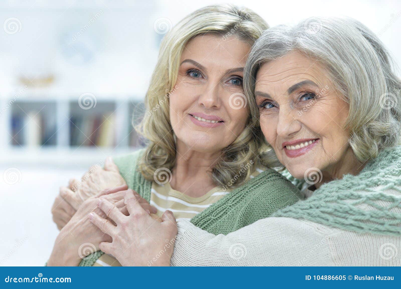 Two smiling women stock image. Image of ladies, grey - 104886605