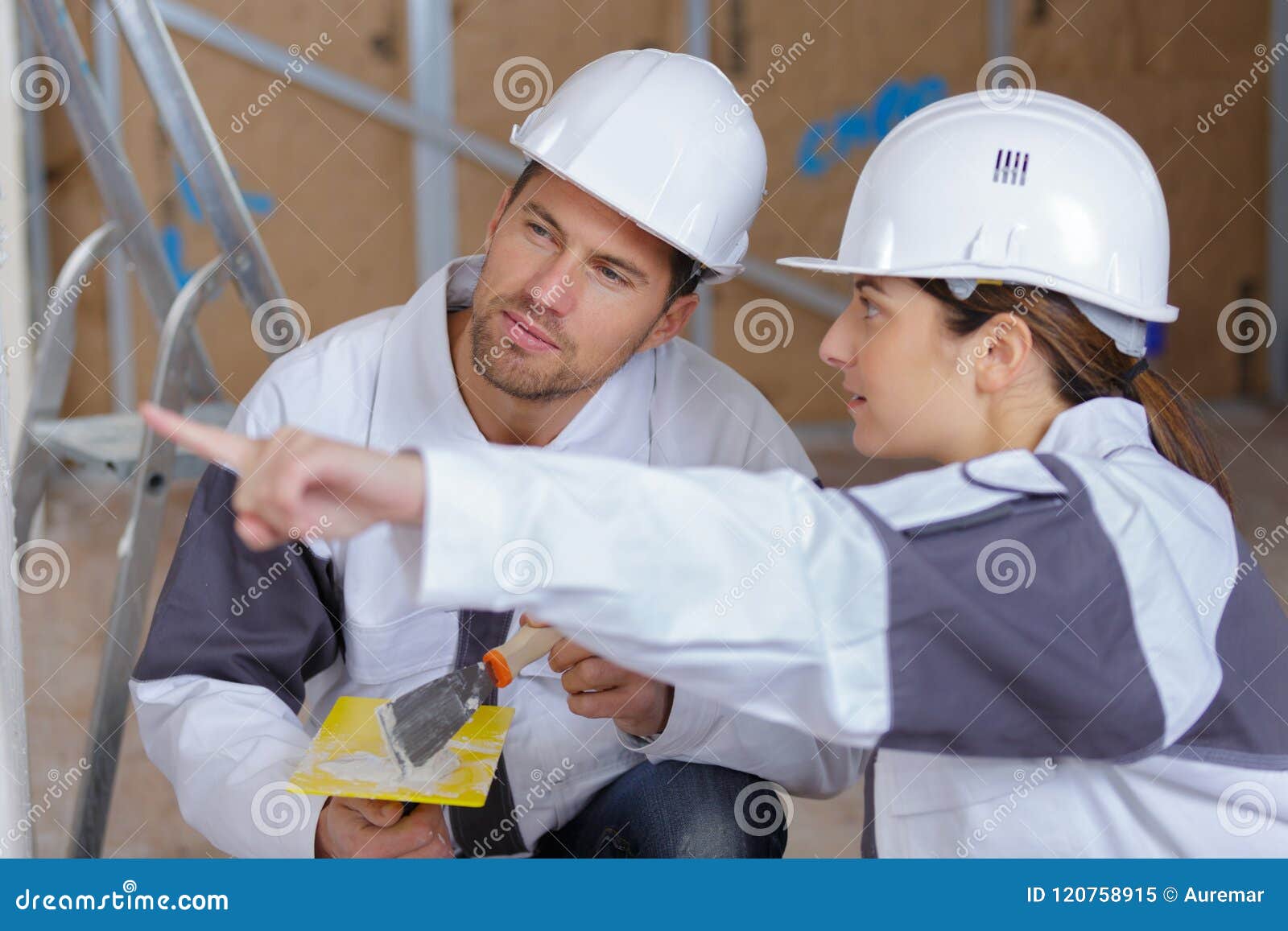 Two Smiling Workers in Uniform Stock Image - Image of home, female ...