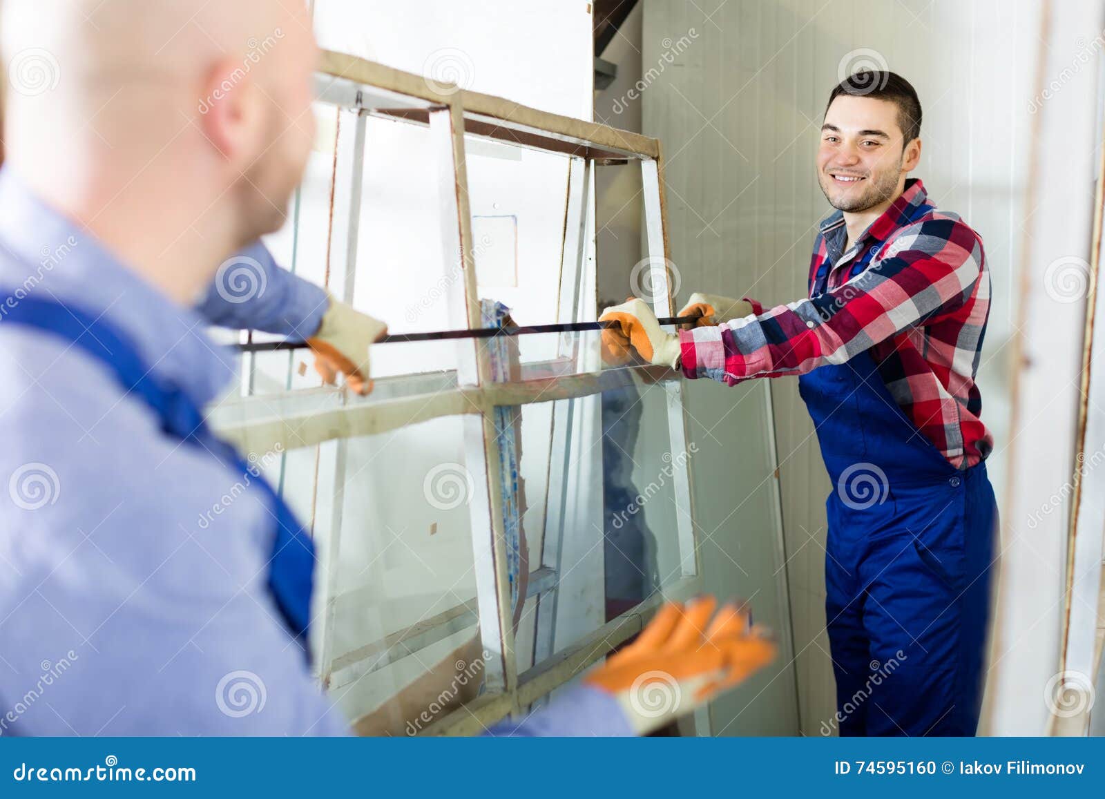 Two Smiling Workmen at Factory Stock Photo - Image of choosing ...
