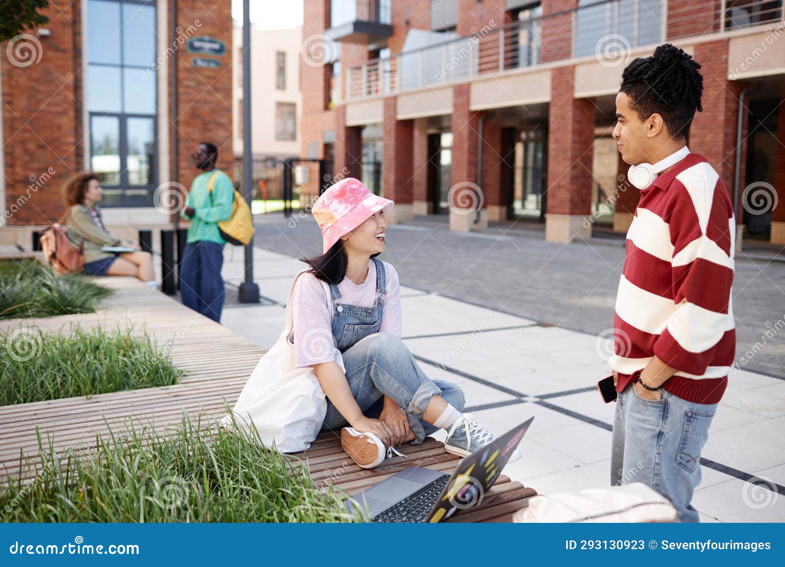 Two Smiling Young Students Chatting on Campus Outdoors Stock Image ...