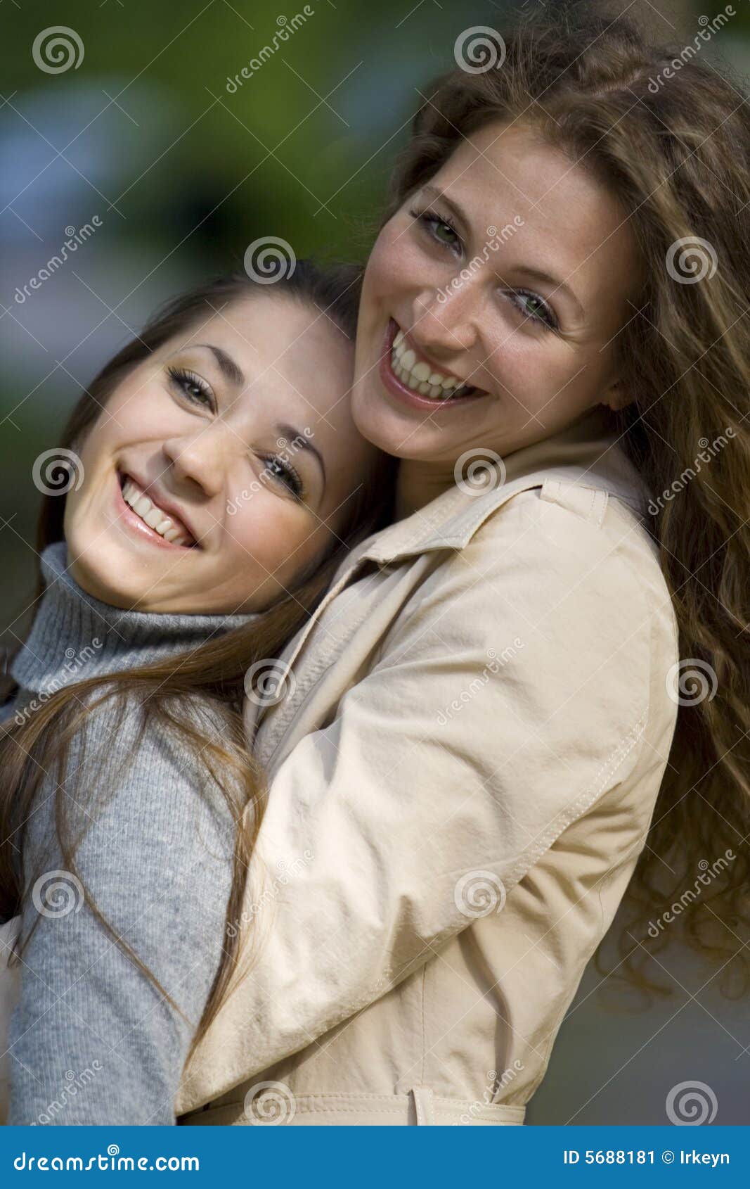 Two smilling girlfriends stock image. Image of park, grin - 5688181