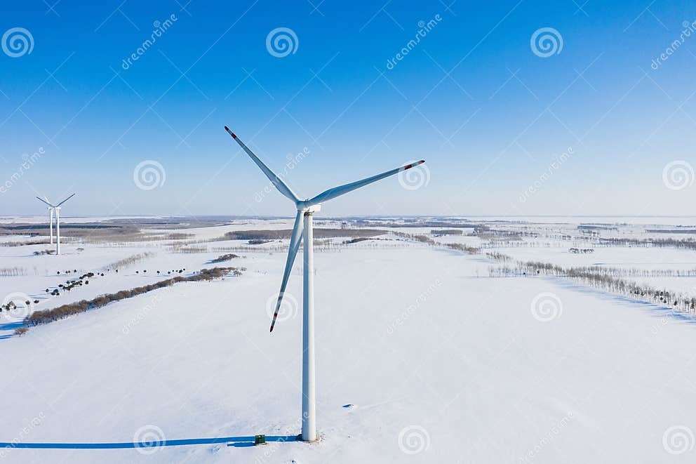 Snow-covered Wind Turbines in a Field Stock Image - Image of winter ...
