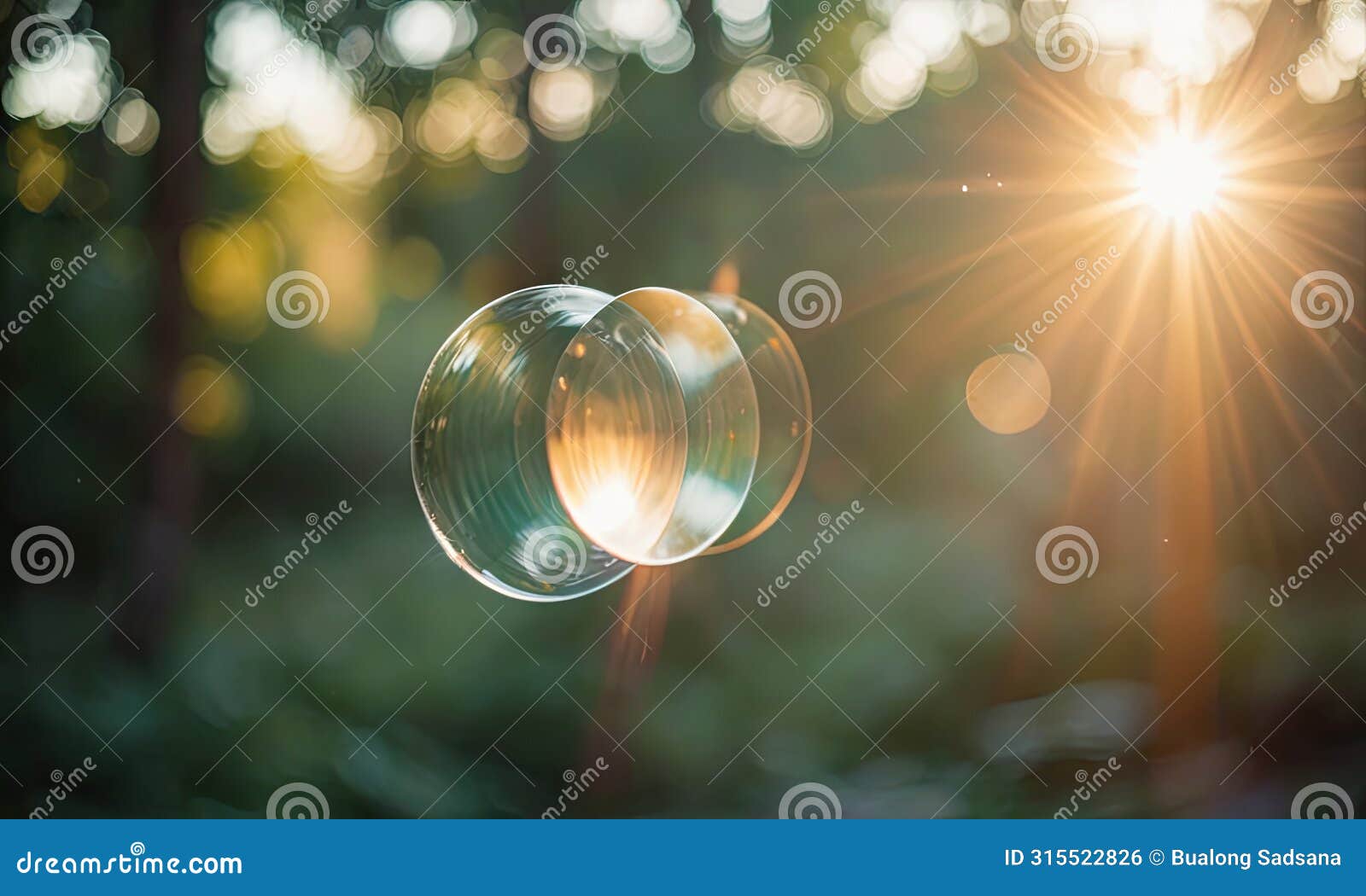 Two Soap Bubbles are Floating in the Air, One in Front of the Other ...