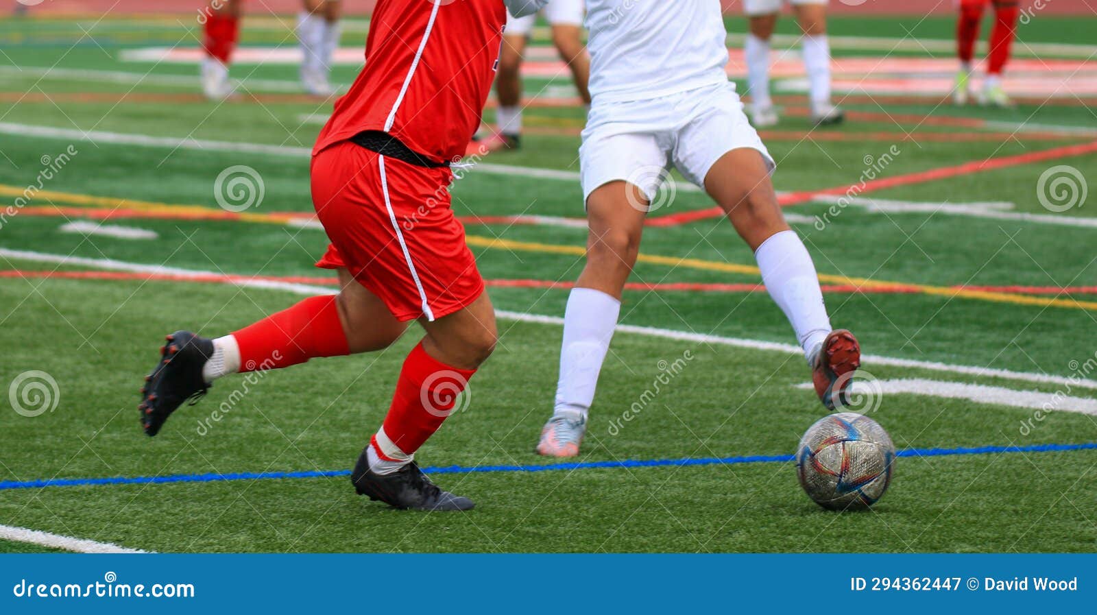 Two Soccer Players Fighting for the Ball during a Game Stock Image ...
