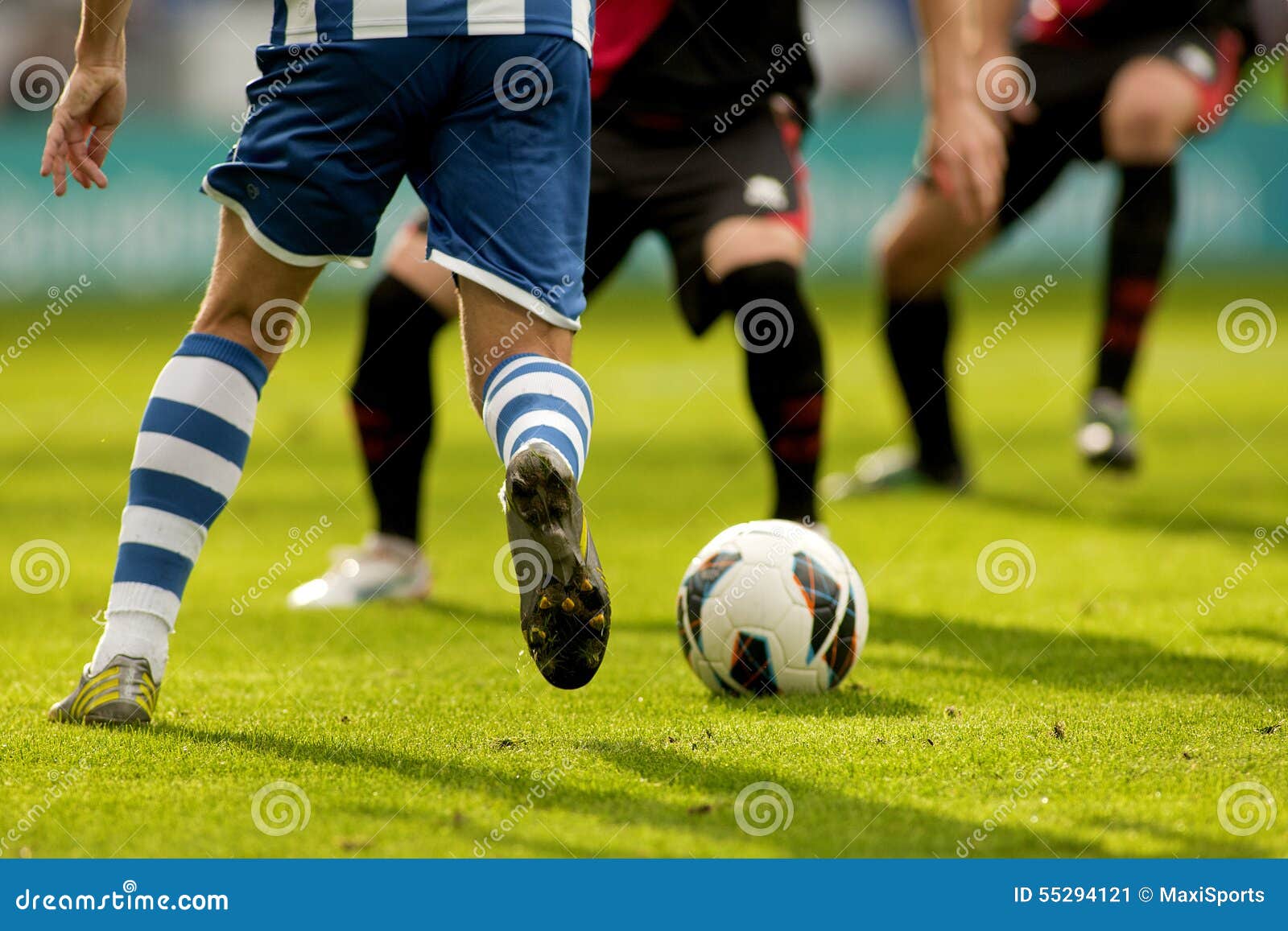 Two soccer players vie stock image. Image of green, movement - 55294121