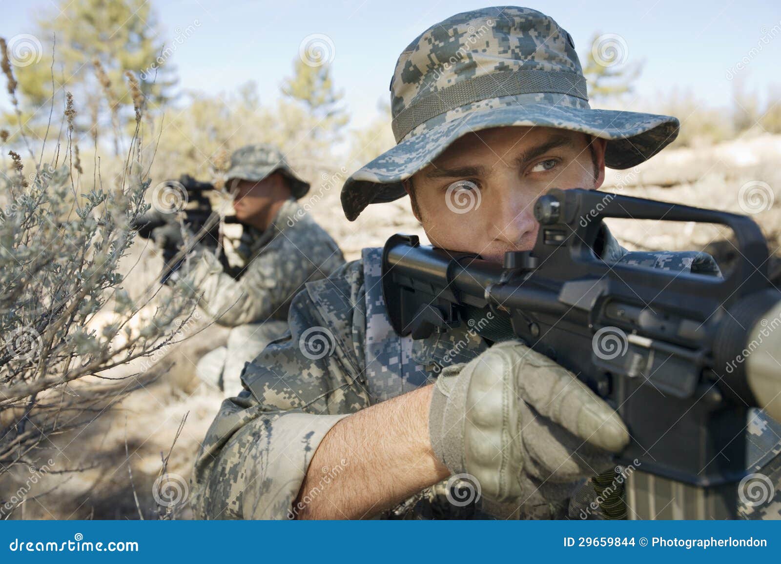 Two Soldiers with Weapons stock photo. Image of pacific - 29659844