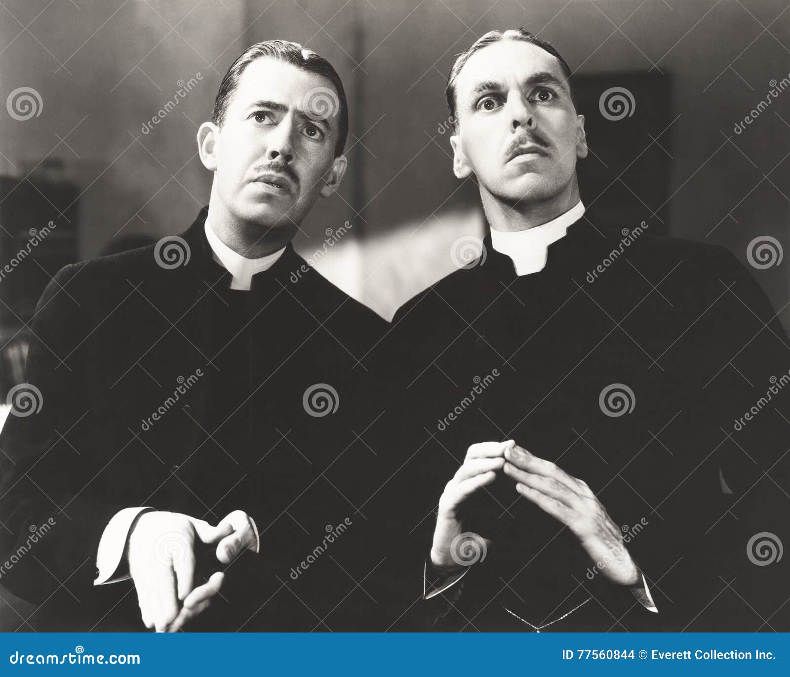 Two solemn priests stock photo. Image of front, adults - 77560844