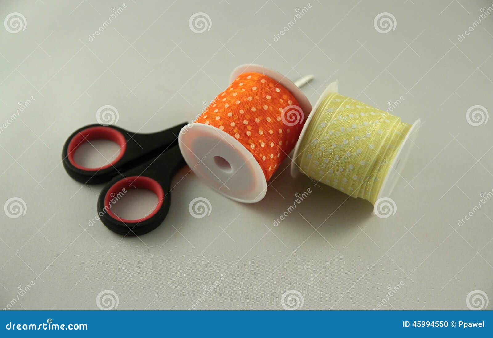 Two spools with scissors stock photo. Image of product - 45994550