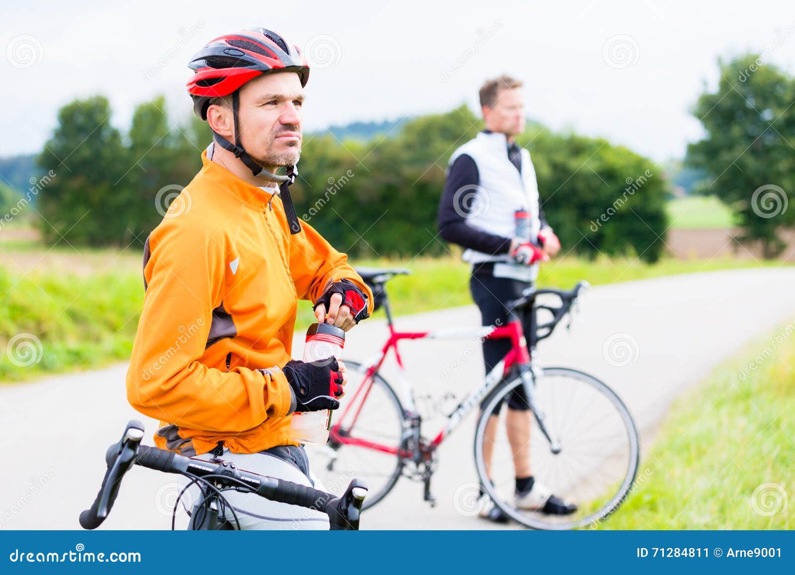 Two Sport Cyclists Having Break Stock Image - Image of comrade ...