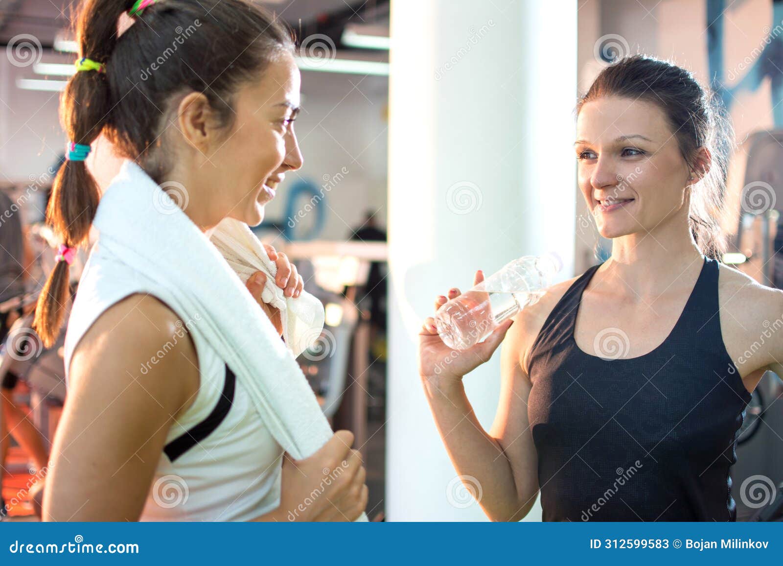 Two Sporty Women Talking at Gym Stock Image - Image of female ...