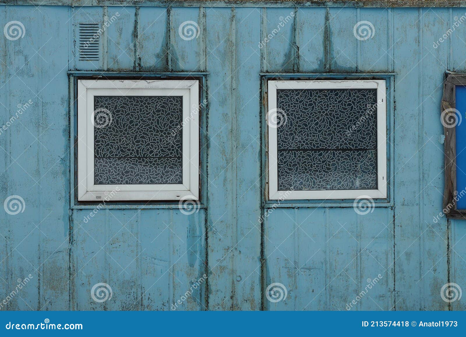 Two Square Windows on a Blue Metal Wall Stock Photo - Image of iron ...