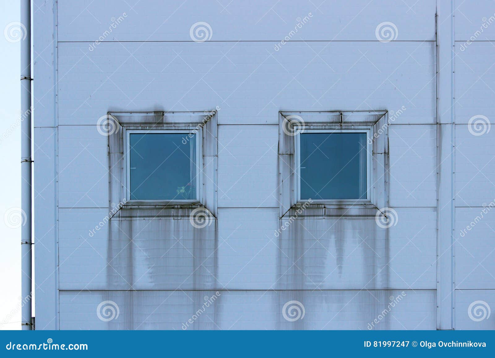 Two Square Windows with Siding Imitating Steel, on Large Sports Complex ...