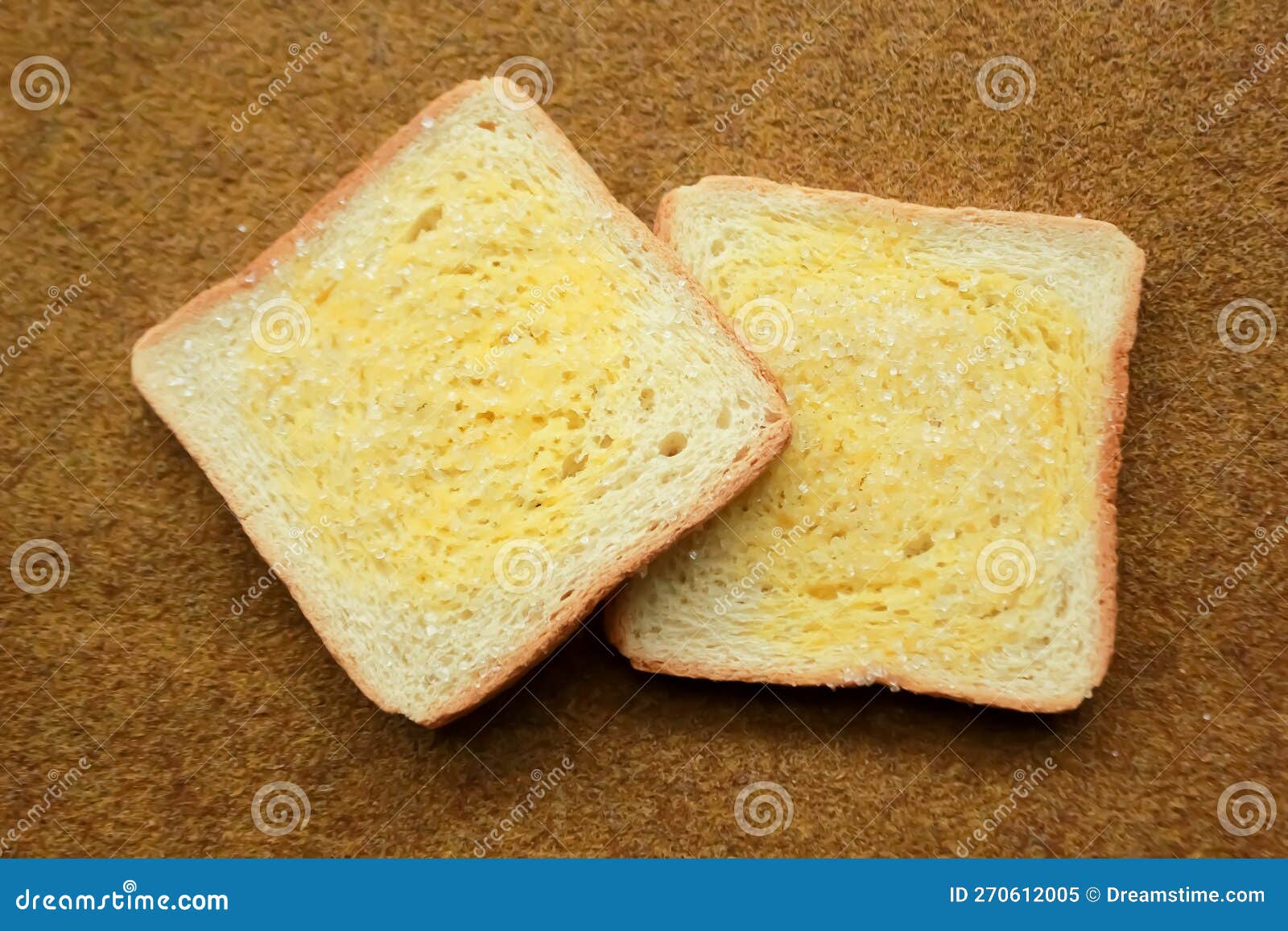 Two Stacked Buns in the Photo with a Brown Background Stock Image ...