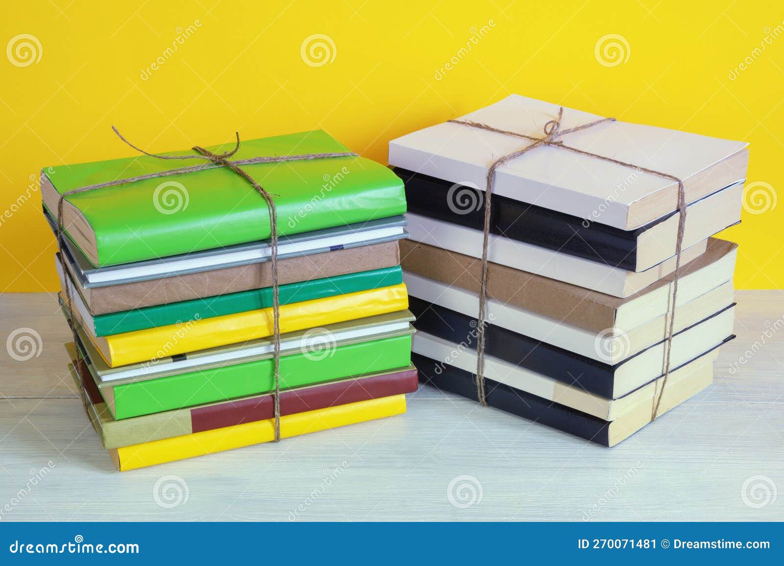 Two Stacks of Books Tied with Rope on Rustic Table. Copy Space Stock ...