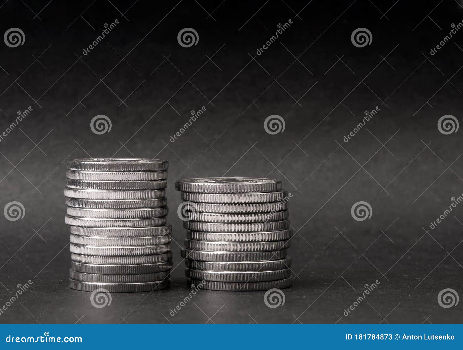 Two Stacks of Coins on a Black Stock Image - Image of coins, money ...
