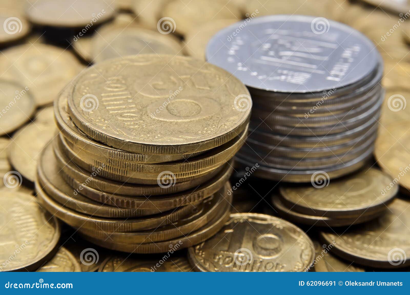 Two Stacks of Coins of Yellow and White Metal Stock Image - Image of ...