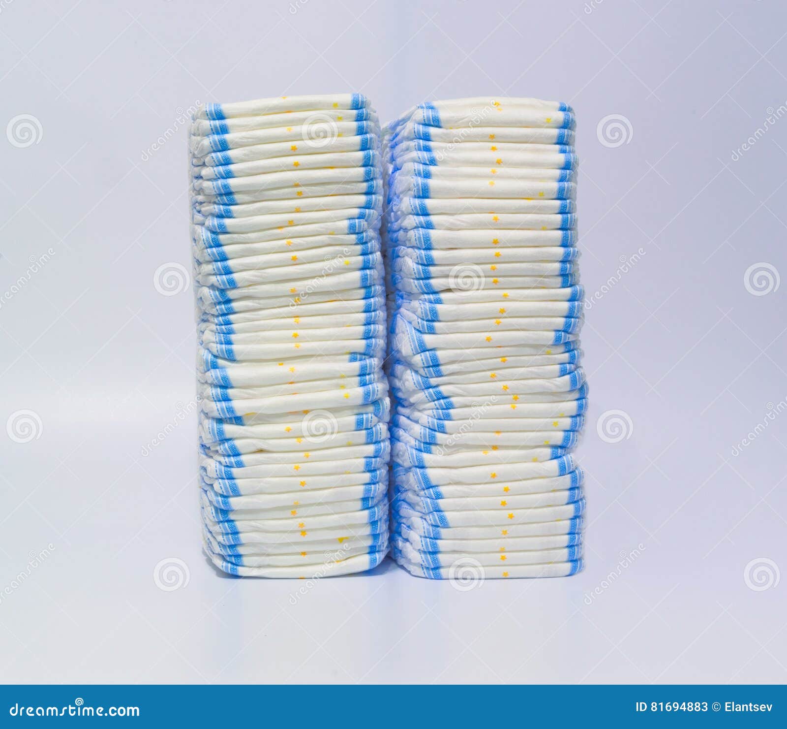 Two Stacks of Diapers on White Background. Stock Image - Image of ...