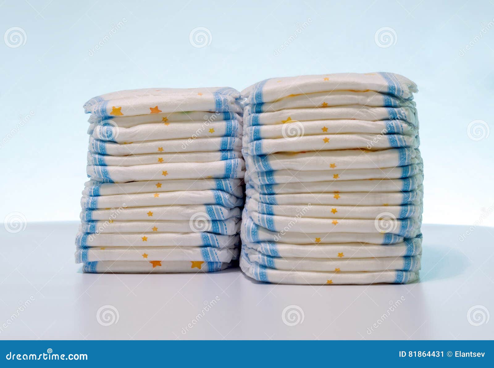 Two Stacks of Diapers on White Background. Stock Image - Image of white ...