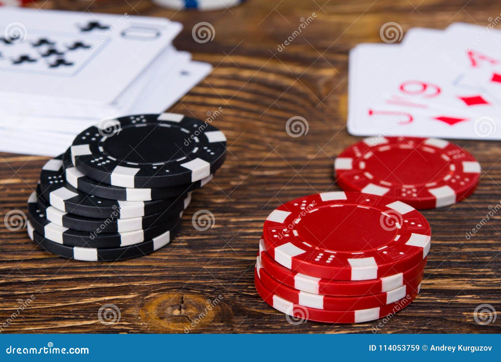 Two Stacks of Poker Chips on a Wooden Table Stock Image - Image of ...