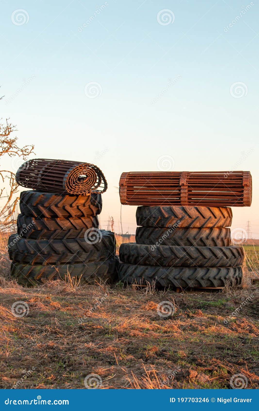 A Set Of Car Tyres Left Or Stored On The Parking Lot Packed In A Blue ...
