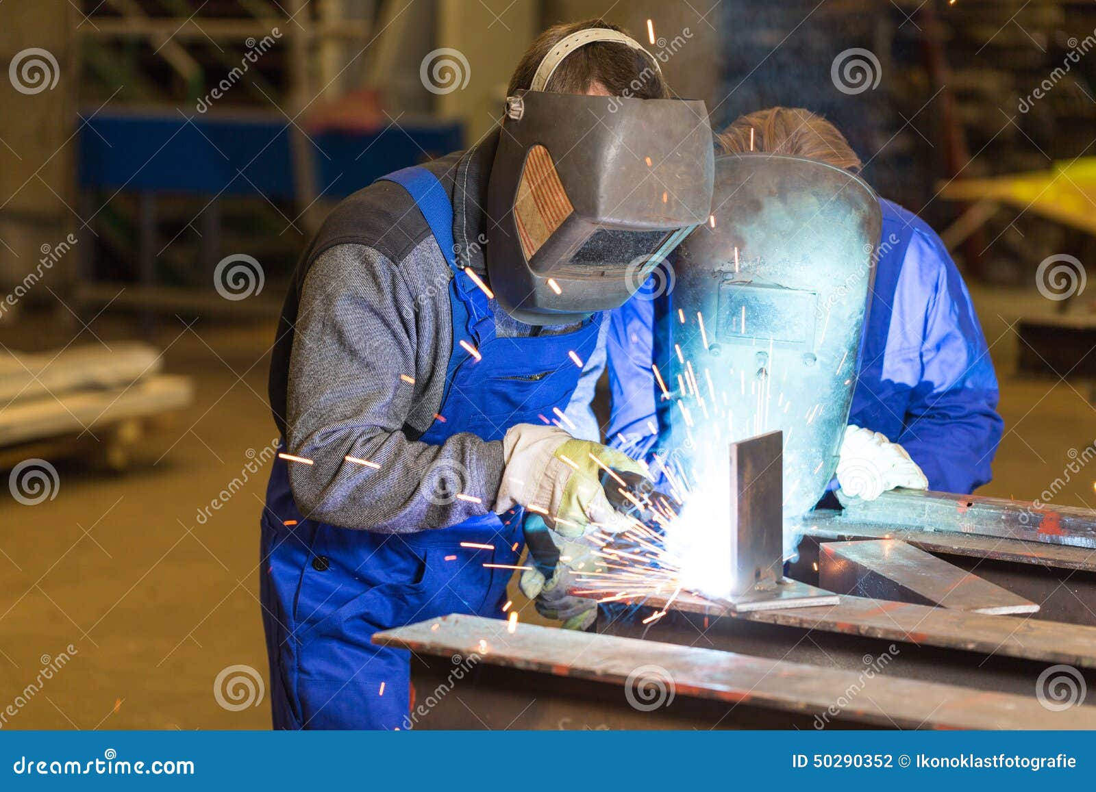 Two Steel Construction Workers Welding Metal Stock Photo - Image of ...