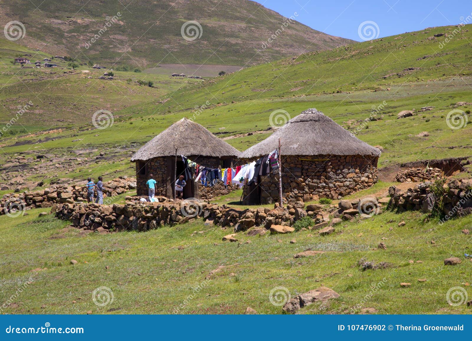Two Stone Rondavels with Traditional Thatched Roofs. Editorial ...