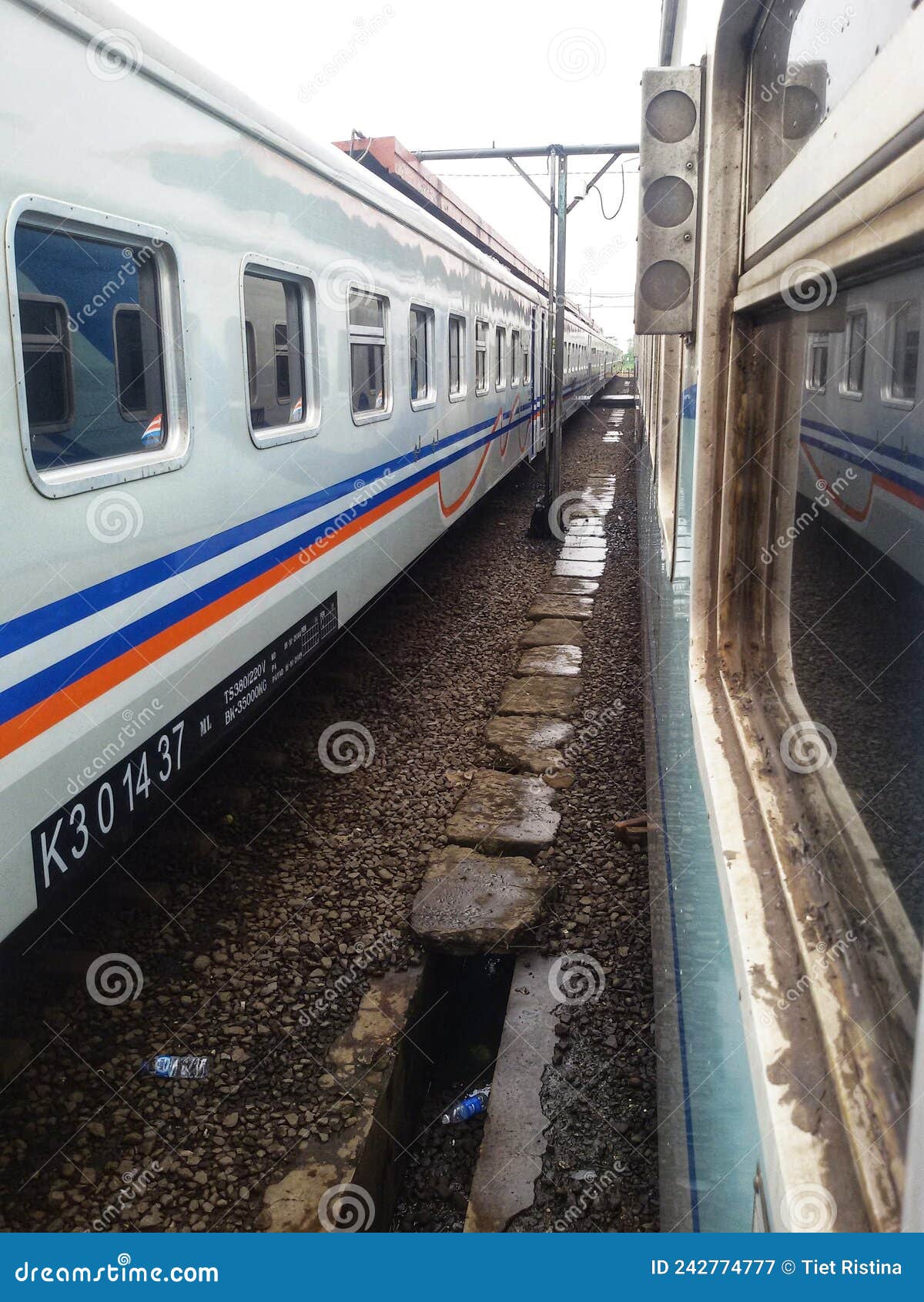Between Two Stopped and Dirty Trains Editorial Photography - Image of ...