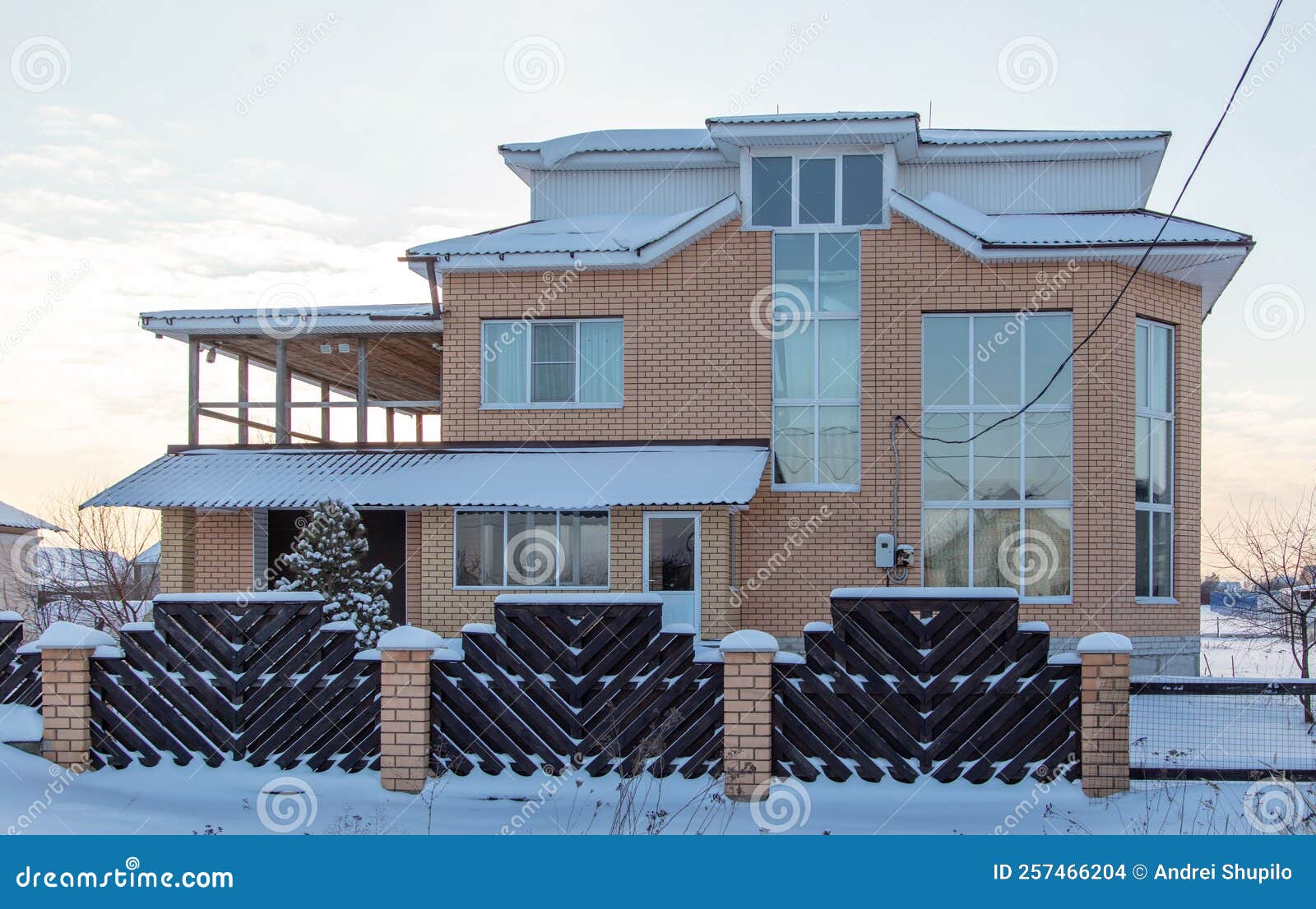 Two-storey Cottage in the Snow. Stock Photo - Image of europe, roof ...