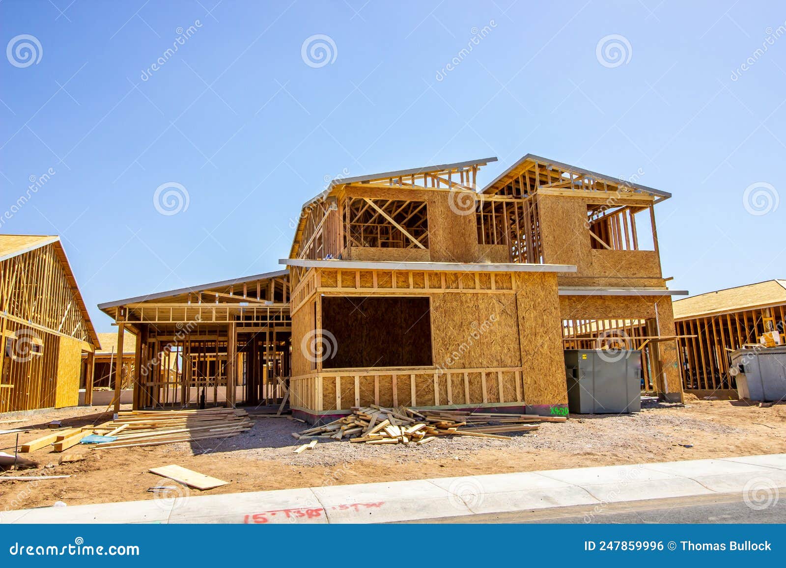 Two Story Home in Framing Stage of Construction Stock Photo - Image of ...