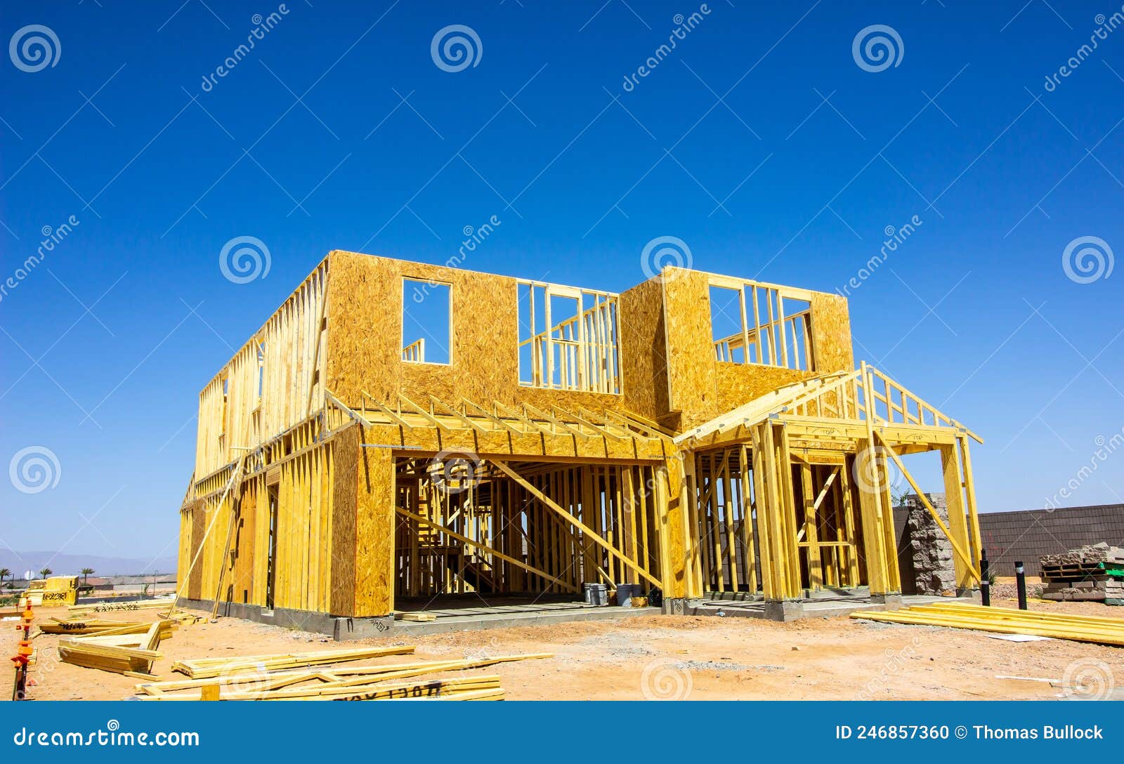 Two Story House in Framing Stage of Construction Stock Photo - Image of ...