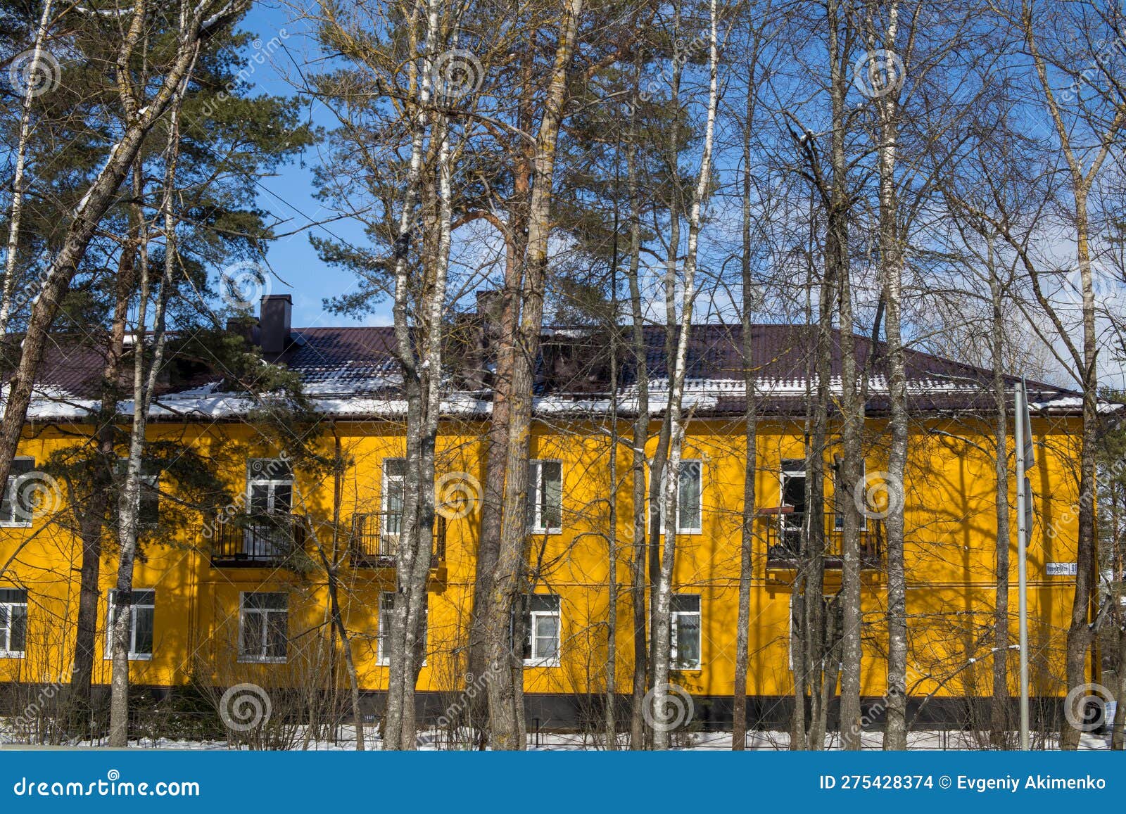 Two-story Yellow House among the Trees Stock Photo - Image of story ...