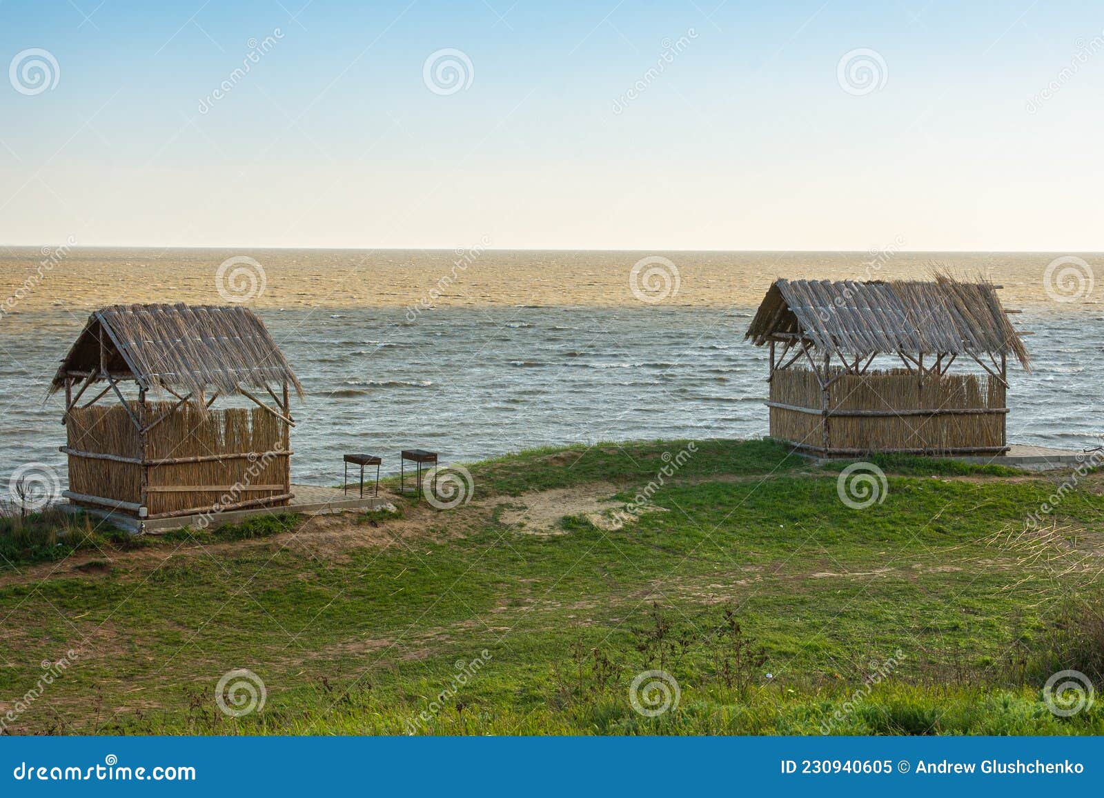 Two Straw Houses on the Seashore Stock Image - Image of building, ocean ...