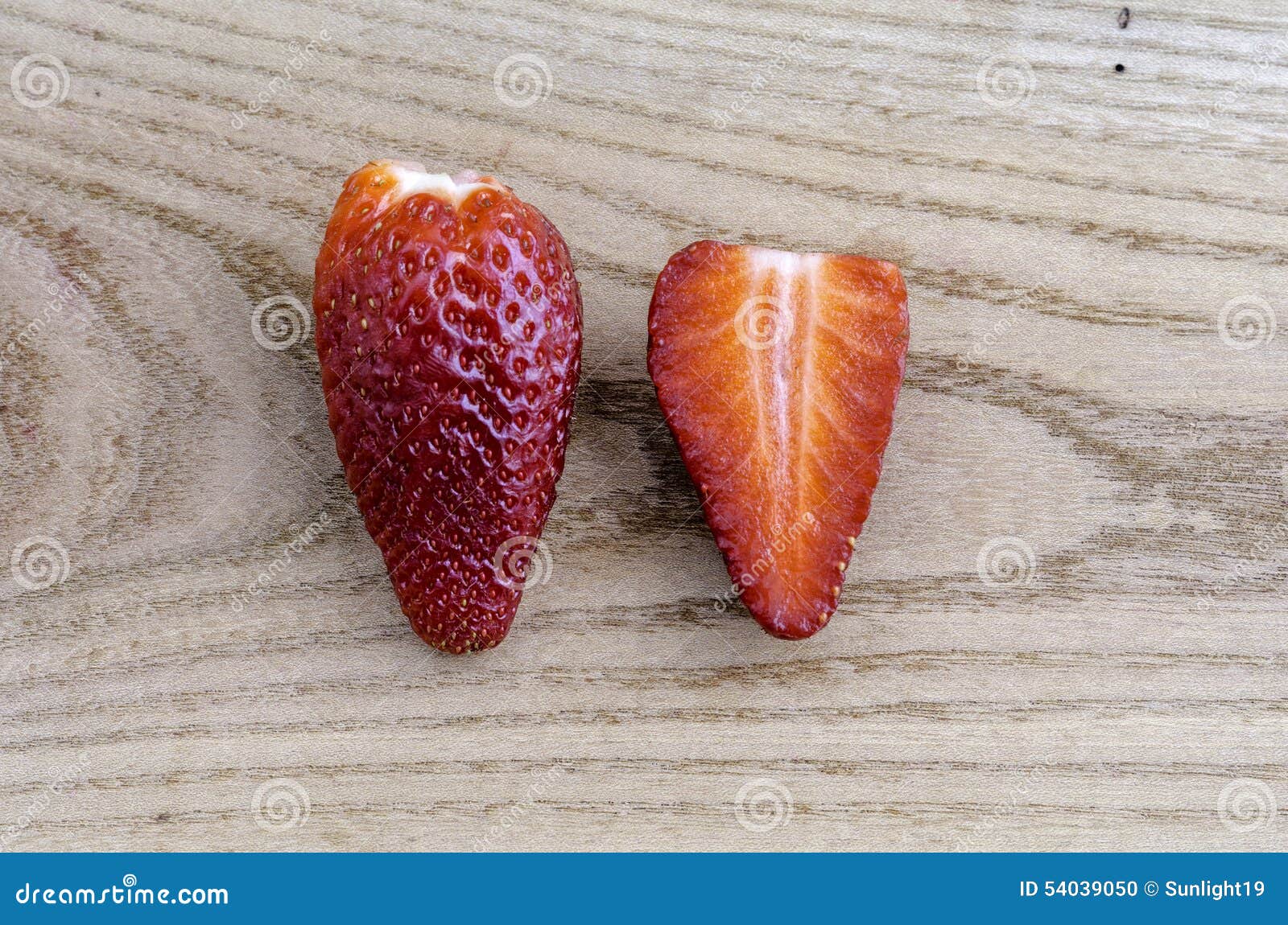 Two Strawberries, One Strawberry Cut in Half Stock Photo - Image of ...